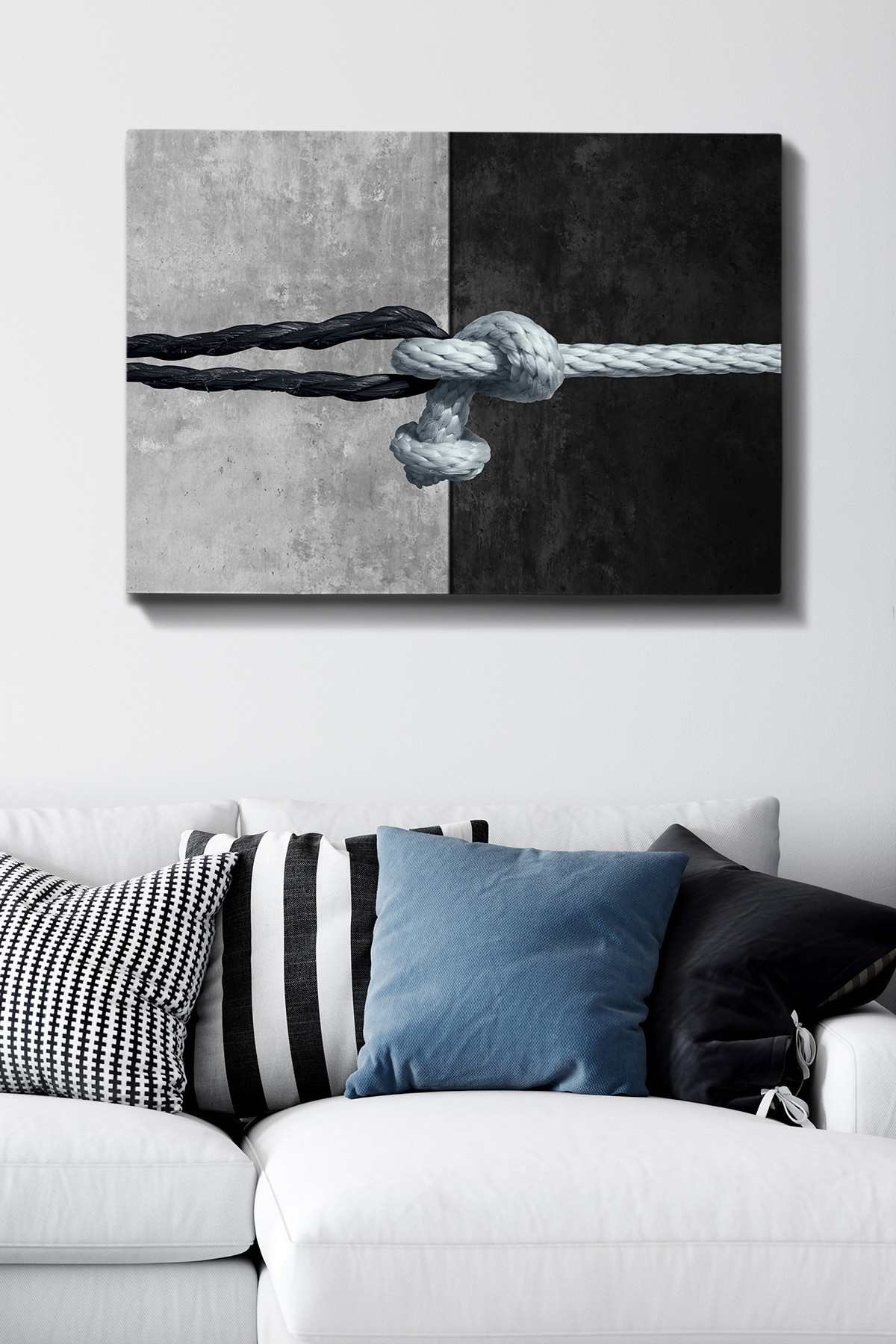 Canvastavla 70x100 cm - Knut av rep som förenar två kontrasterande ytor ...